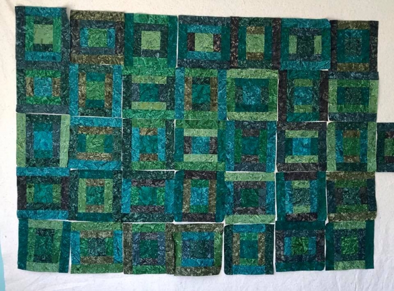 green geometric batik quilts