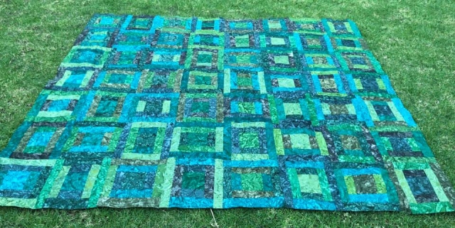 green geometric batik quilts